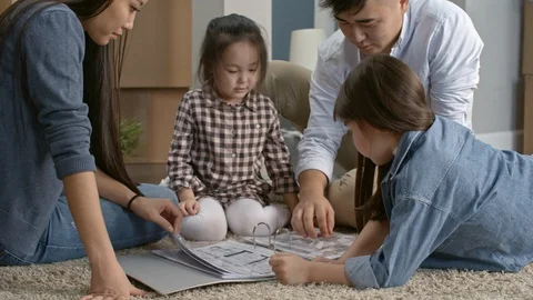 Family Discussing Interior Design Ideas | Stock Video | Pond5