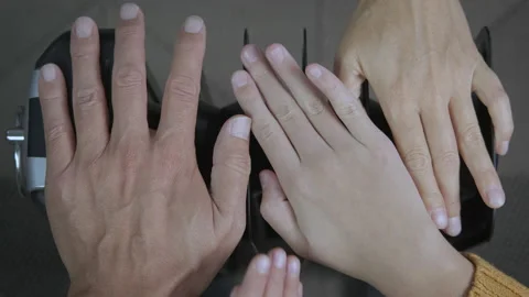 The family is heated by a radiator. | Stock Video | Pond5