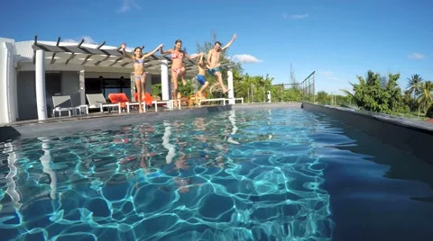 Family jumping into pool and swimming un... | Stock Video | Pond5