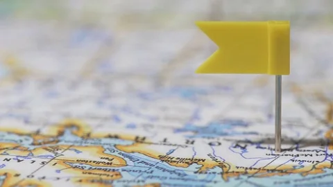 Family marking with small flags on map p... | Stock Video | Pond5