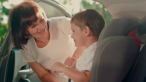 Family road trip. Mom cares about her so... | Stock Video | Pond5