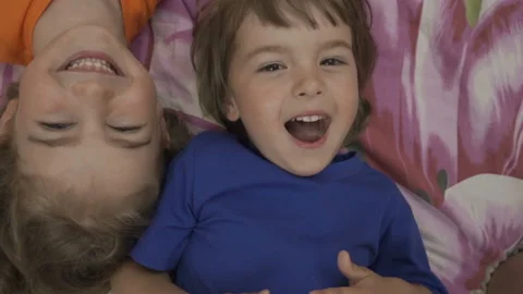 Family selfie. Excited young children pl... | Stock Video | Pond5