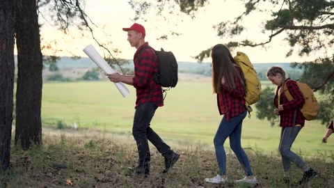 Family tourism. Group of people with map... | Stock Video | Pond5