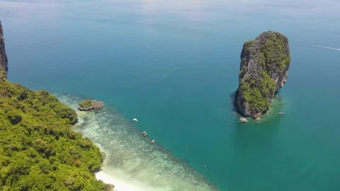 Famous limestone cliff in Ocean with cor... | Stock Video | Pond5