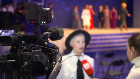 Famous person giving interview to female... | Stock Video | Pond5