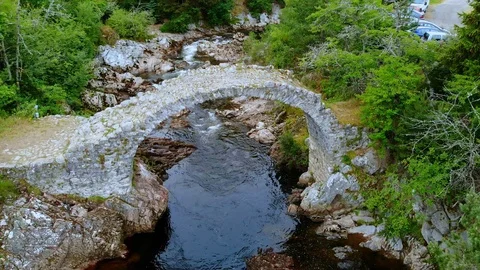 Famous stone bridge over a creek in the ... | Stock Video | Pond5