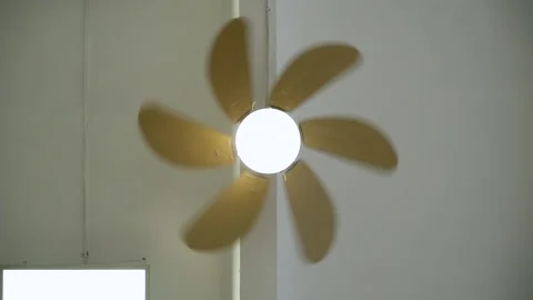Fan lamp with a light bulb. Chandelier f... | Stock Video | Pond5