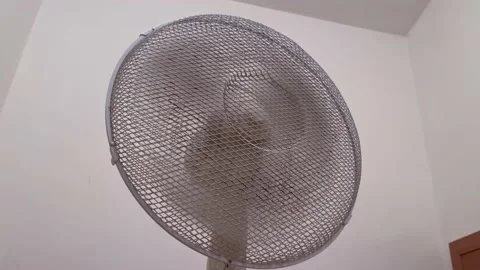 Fan spinning at home with white wall in ... | Stock Video | Pond5