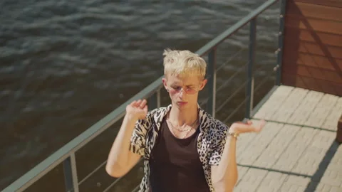 Fancy Boy Dancing Vogue on Yacht | Stock Video | Pond5