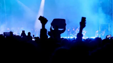 Fans dancing and waving support and kind... | Stock Video | Pond5