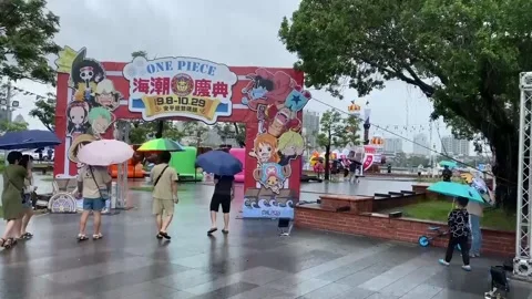 Fans dive into world of "One Piece" at e... | Stock Video | Pond5