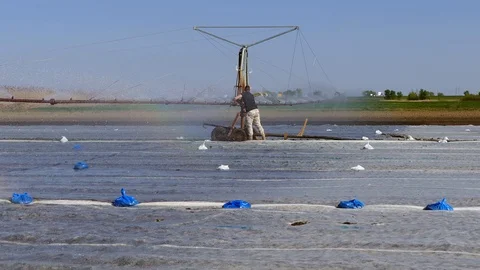 The farmer sets up typhon system during ... | Stock Video | Pond5