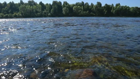 fast flow in the wide shallow river, vie... | Stock Video | Pond5