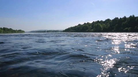 fast flow in the wide shallow river, vie... | Stock Video | Pond5