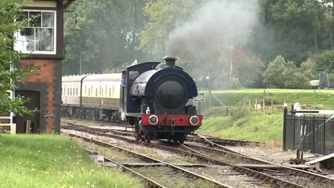 A Fast Moving Steam Engine Connecting to... | Stock Video | Pond5