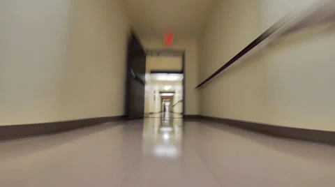 Fast walk in building corridors. POV. | Stock Video | Pond5