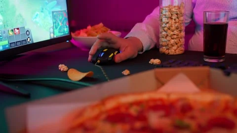 The Fat gamer plays at the computer and ... | Stock Video | Pond5