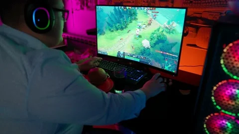 The Fat gamer plays at the computer and ... | Stock Video | Pond5