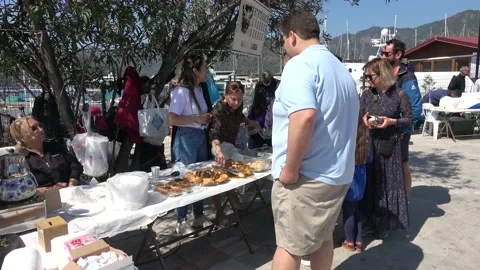 Fat man approaches a counter selling coo... | Stock Video | Pond5