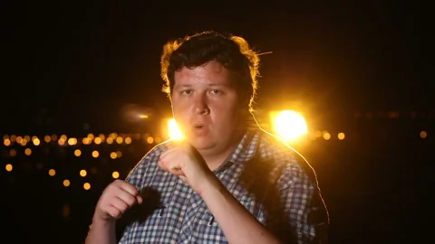 Fat man standing in boxer pose at night ... | Stock Video | Pond5