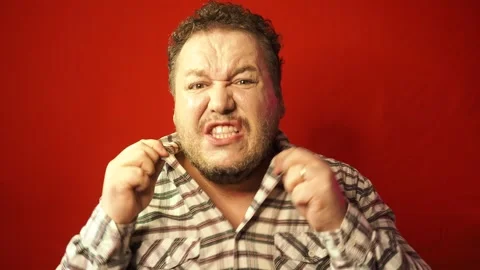 Fat man swearing and crying. Red backgro... | Stock Video | Pond5