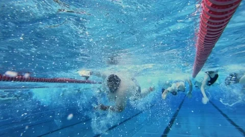 A fat man swims in the pool. Lots of peo... | Stock Video | Pond5