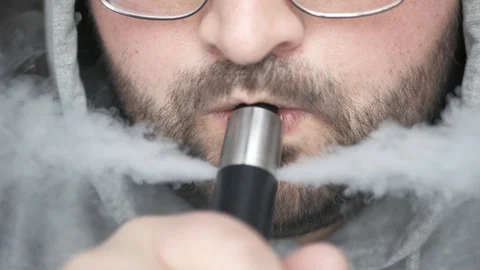 Fat man vaping electronic cigarette and ... | Stock Video | Pond5