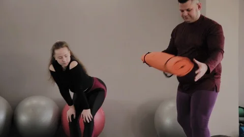 Fat man woman train in gym together. | Stock Video | Pond5