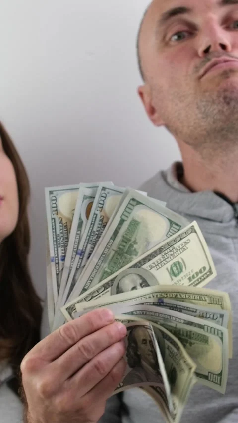 father and daughter a lot of money in th... | Stock Video | Pond5