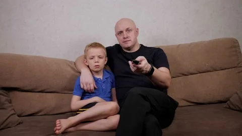 A father and son with a remote control w... | Stock Video | Pond5