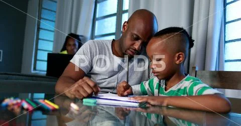 Father mentoring son, dad helping kid with homework study ~ Hi Res ...