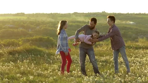 a father with three children in nature, ... | Stock Video | Pond5