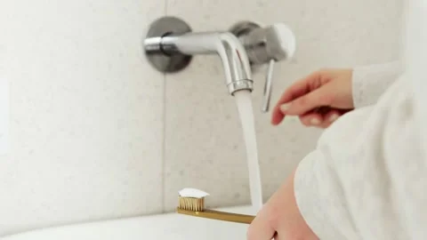 Faucet in bathroom with running water ta... | Stock Video | Pond5