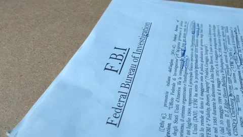 fbi agent put a fbi top secret document ... | Stock Video | Pond5
