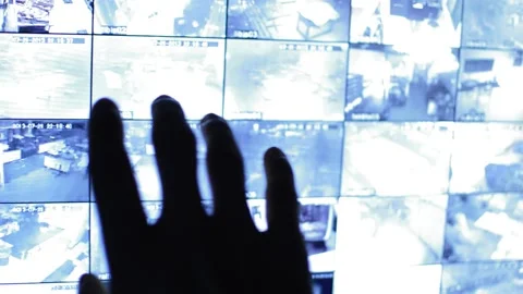 fbi agent using cctv surveillance monito... | Stock Video | Pond5