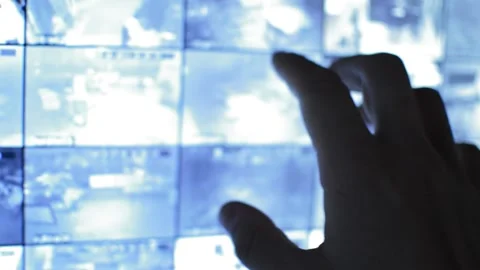 fbi spy using blue cctv surveillance mon... | Stock Video | Pond5