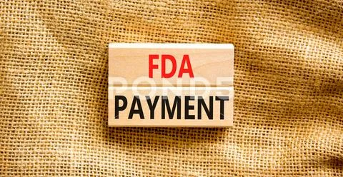FDA Food and Drug Administration payment symbol. Concept words FDA ...