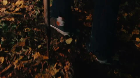Feet of horrible maniac creeping in dark... | Stock Video | Pond5