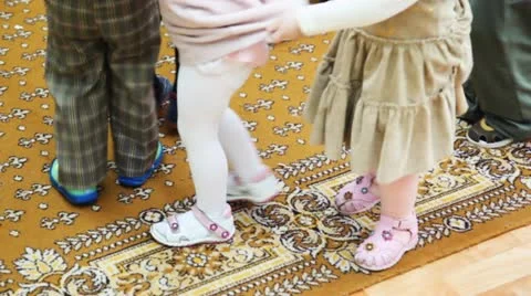 feet of kids walking in circle each othe... | Stock Video | Pond5