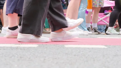 feet of people walking close up, LGBT co... | Stock Video | Pond5