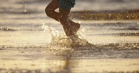 Feet running on the sand on beach, slow ... | Stock Video | Pond5