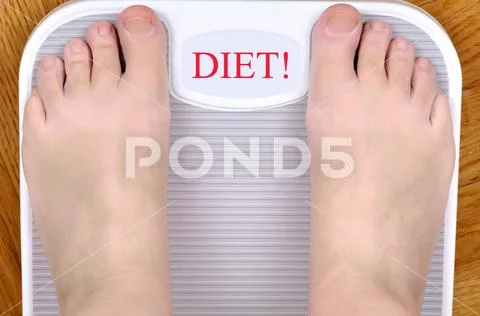 Feet on the scale ~ High Resolution & Quality #75715758