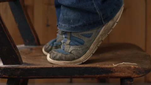 Feet standing on stool on tip toes | Stock Video | Pond5