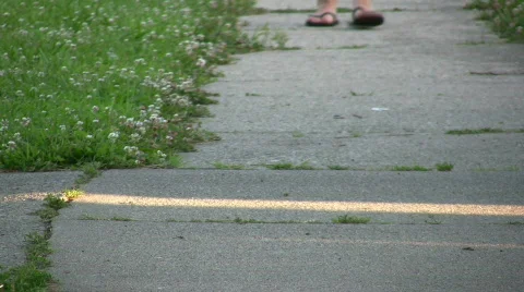 Feet walking down Side walk | Stock Video | Pond5