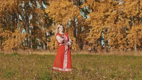 Feisty adult woman in red national dress... | Stock Video | Pond5
