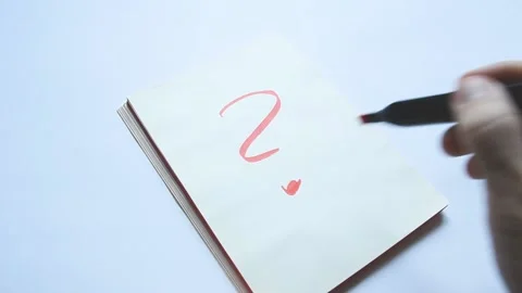 a felt pen drawing a red question mark o... | Stock Video | Pond5