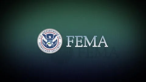 Fema Logo slides toward camera over rain... | Stock Video | Pond5