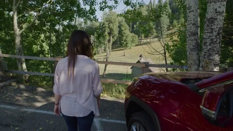 Female actor walking to wood rail overlo... | Stock Video | Pond5