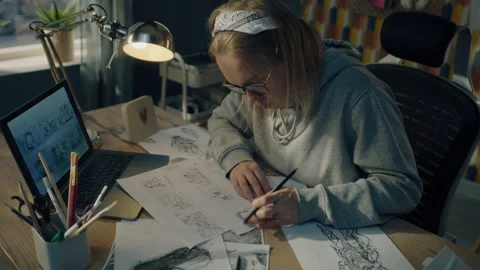 Female animator creates sketch for carto... | Stock Video | Pond5