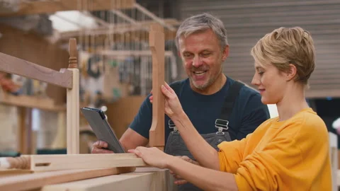 Female Apprentice Learning From Mature M... | Stock Video | Pond5